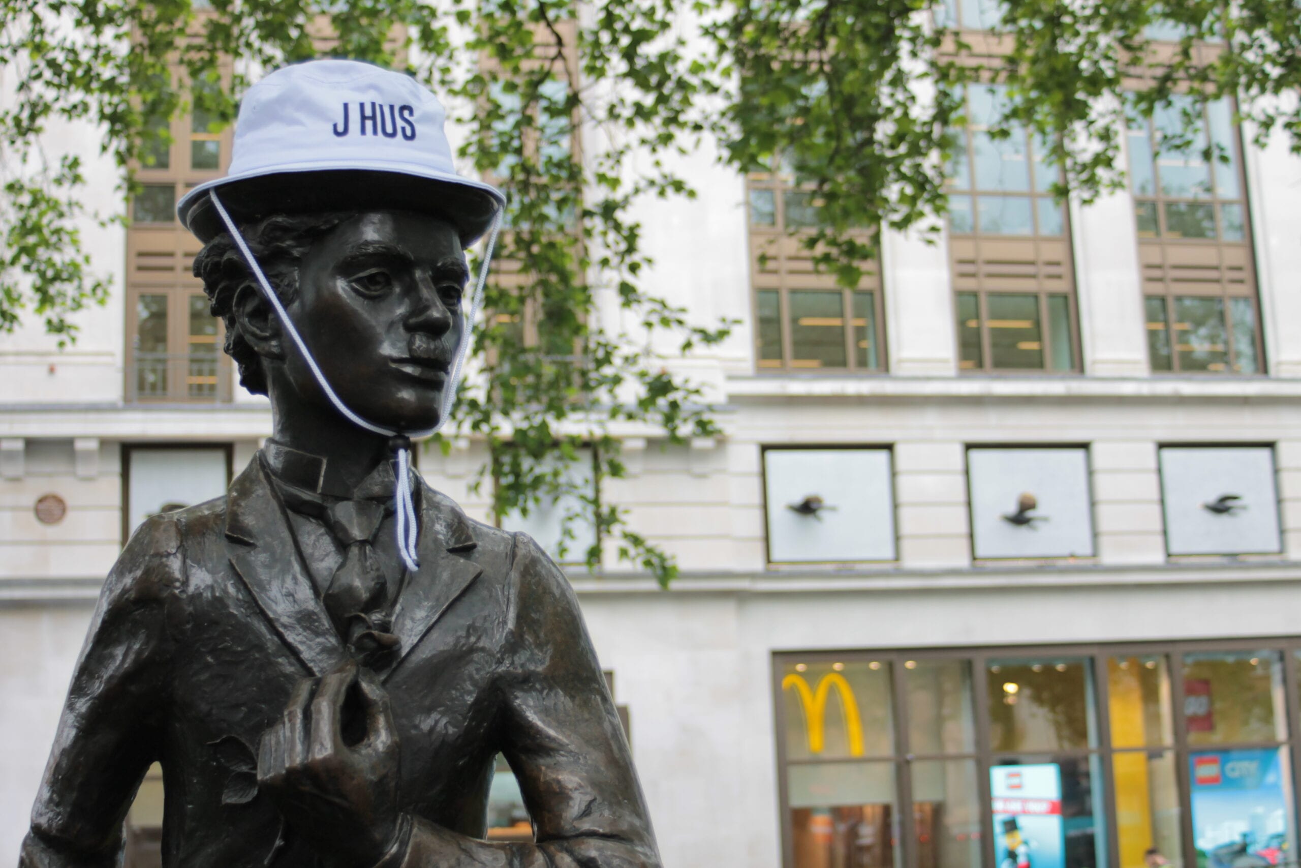 J Hus hats have been appearing on statues around London - GRM Daily