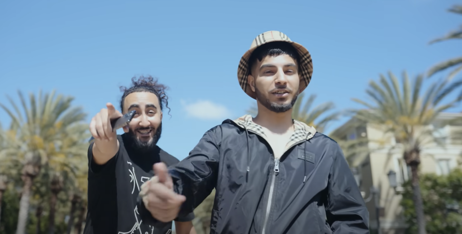 Caps & Ay Em live their "Best Life" overseas in new visuals - GRM Daily