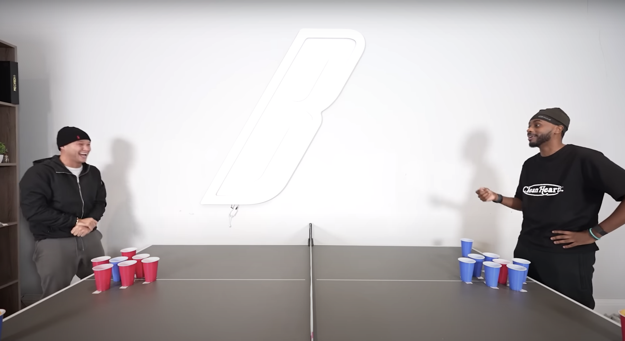 Johnny Carey & Sharky play beer pong in new upload - GRM Daily