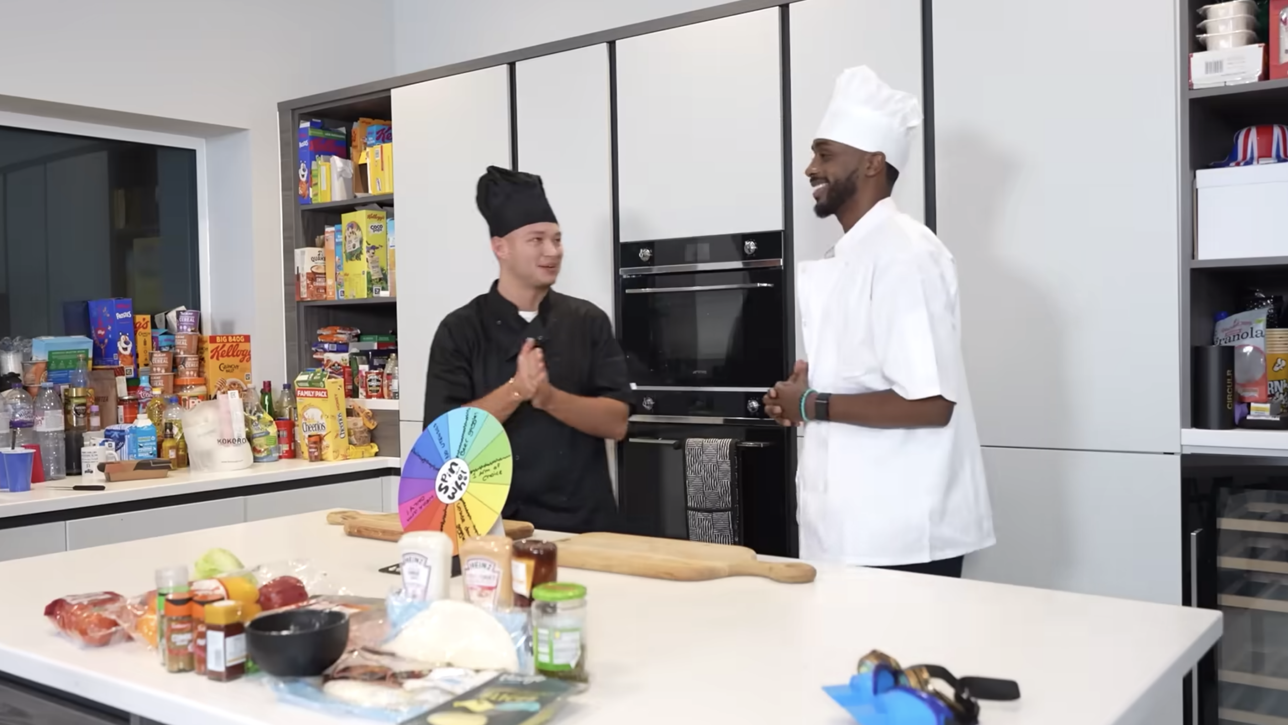 Watch Johnny Carey & Sharky face off in cooking challenge with a twist - GRM Daily